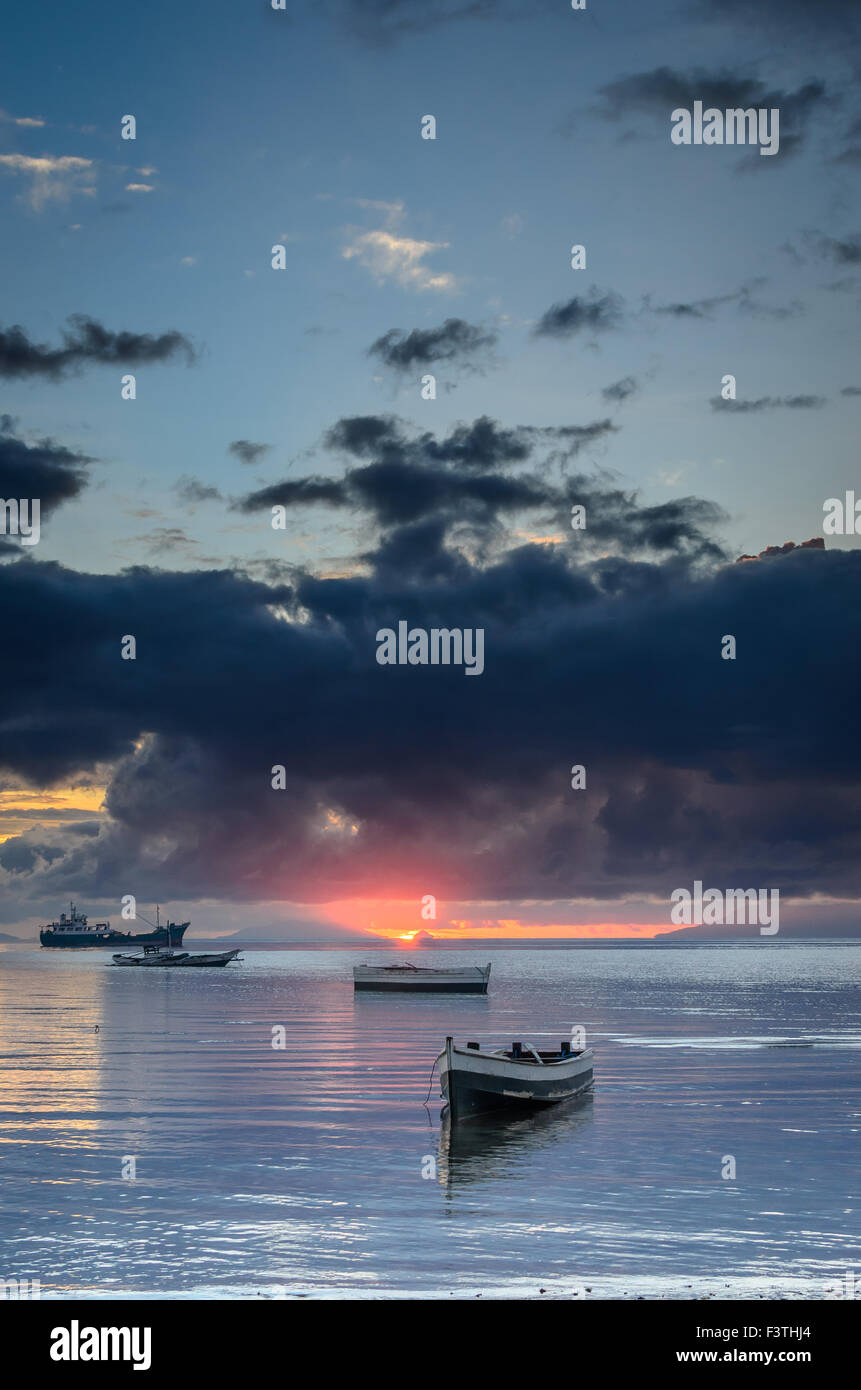 Boat Under Storm Stock Photo - Alamy