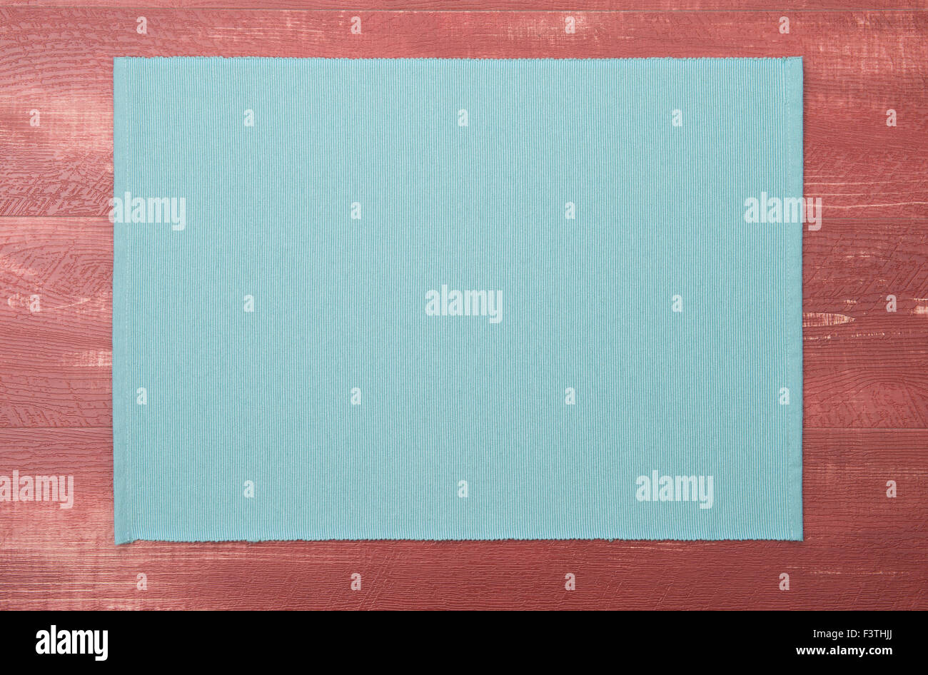 Place mat on wooden deck table Stock Photo - Alamy