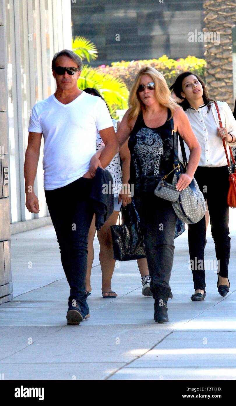 Fashion Designer Lloyd Klein and socialite Jocelyn Wildenstein out and ...