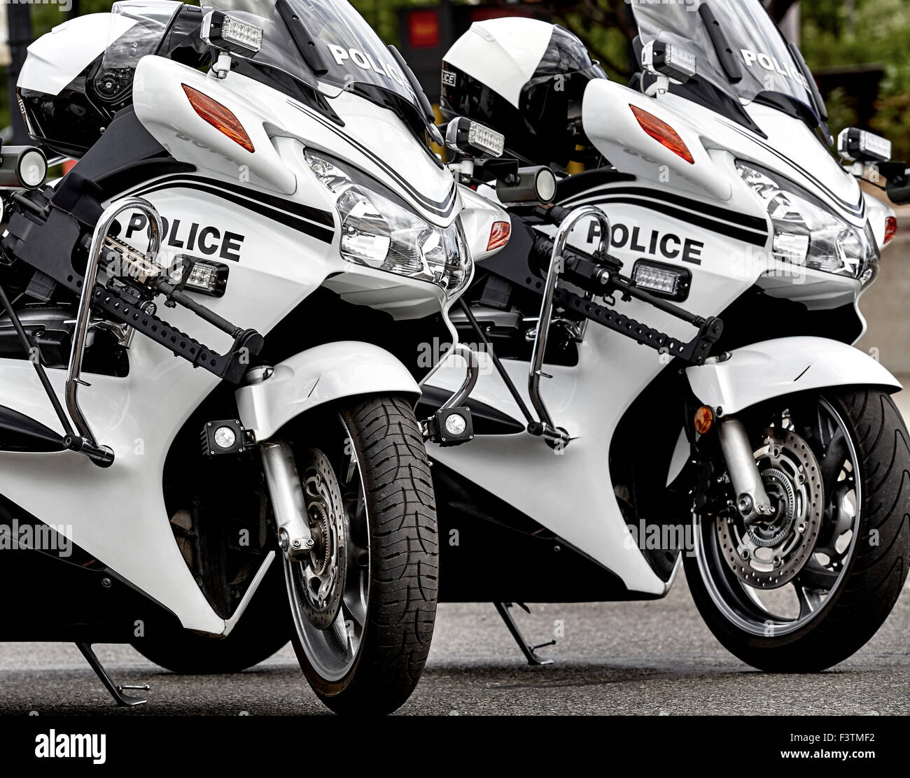 Police motorcycles parked on road Stock Photo - Alamy