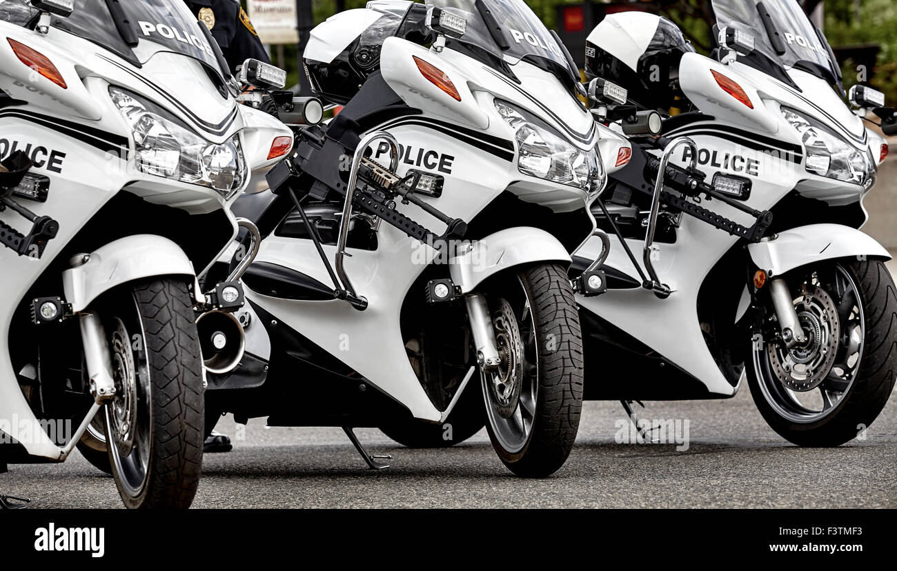 Police motorcycles parked on road Stock Photo - Alamy