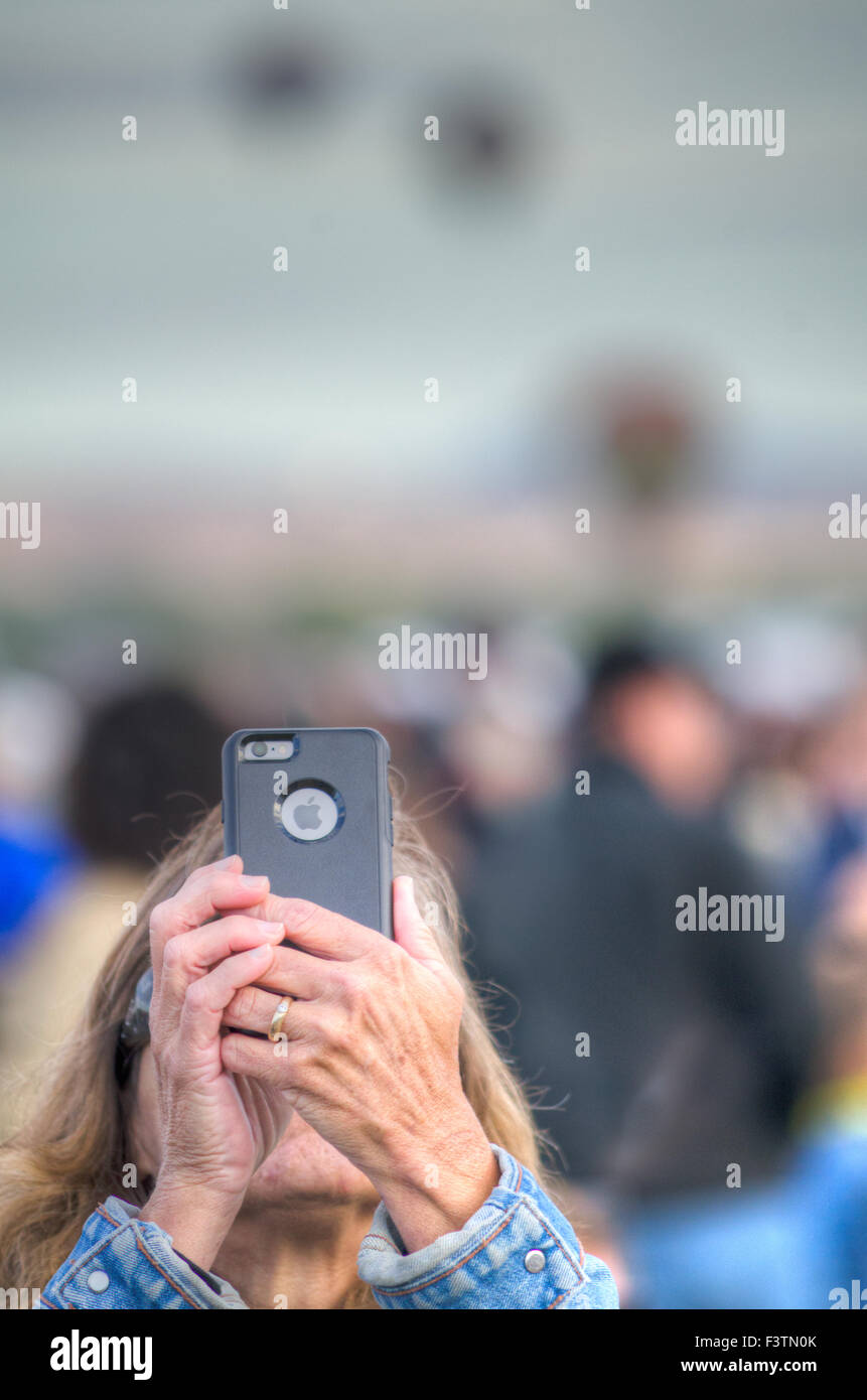 Spectator taking pictures at Albuquerque International Balloon Fiesta ...