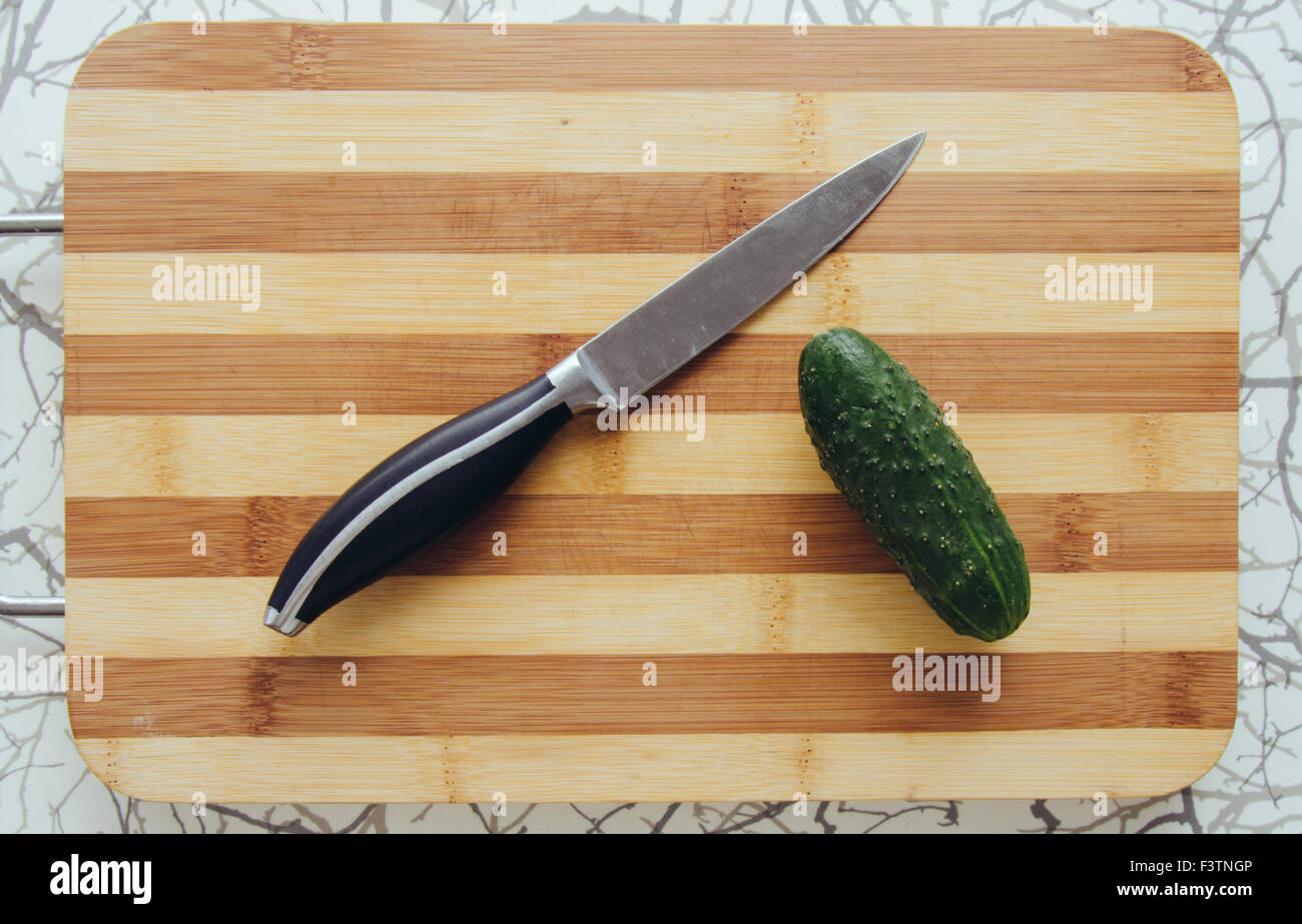 Cucumber cutting board knife hi-res stock photography and images - Alamy