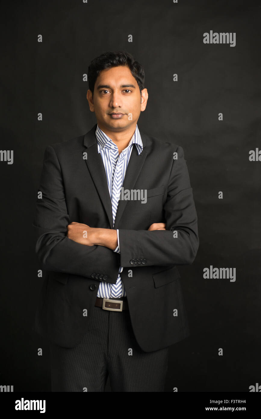 indian business male with black background Stock Photo - Alamy
