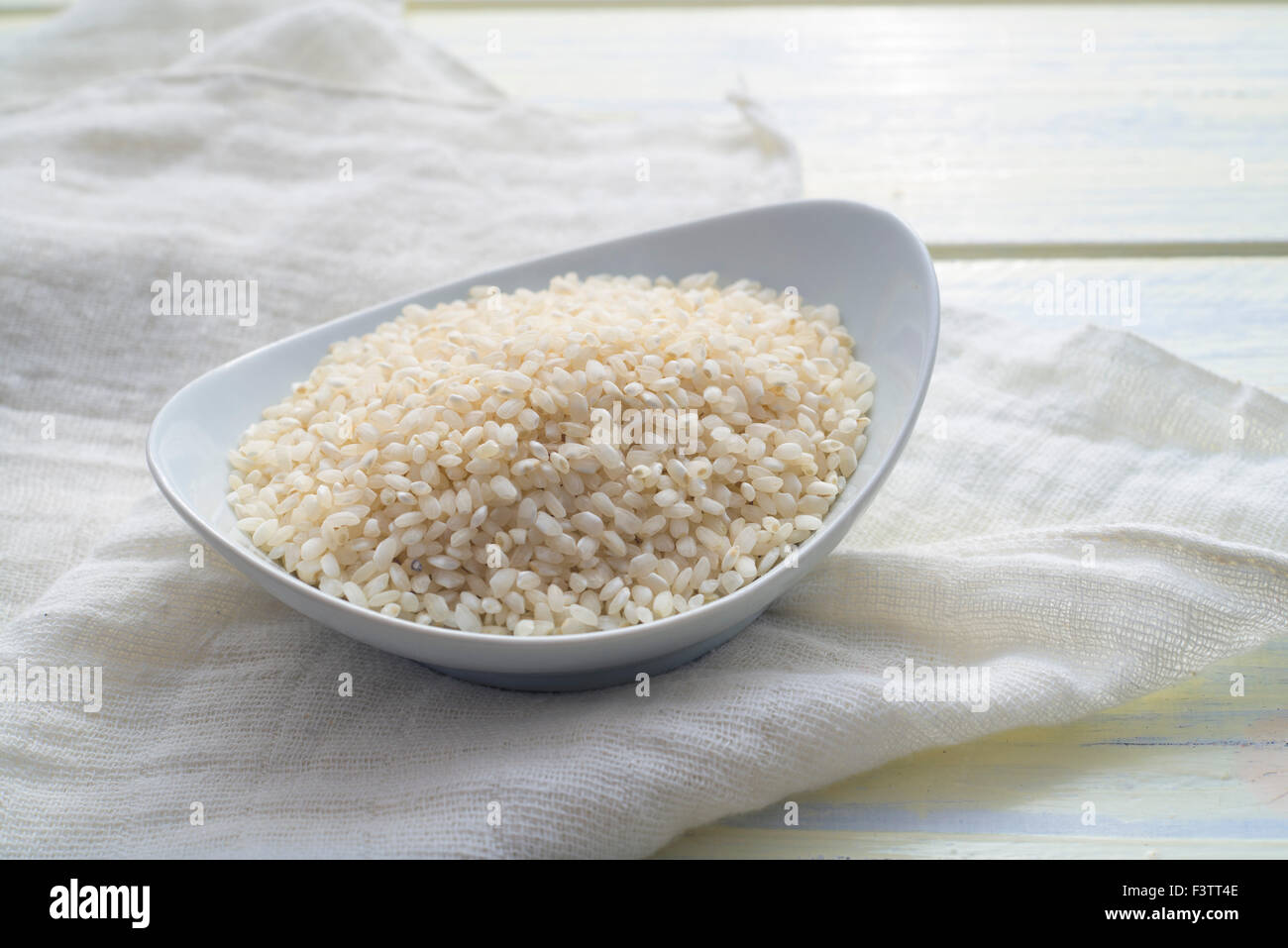 White bowl full of rice Stock Photo - Alamy