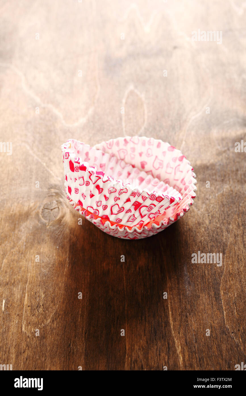 Forms for baking the cake, wooden background Stock Photo - Alamy