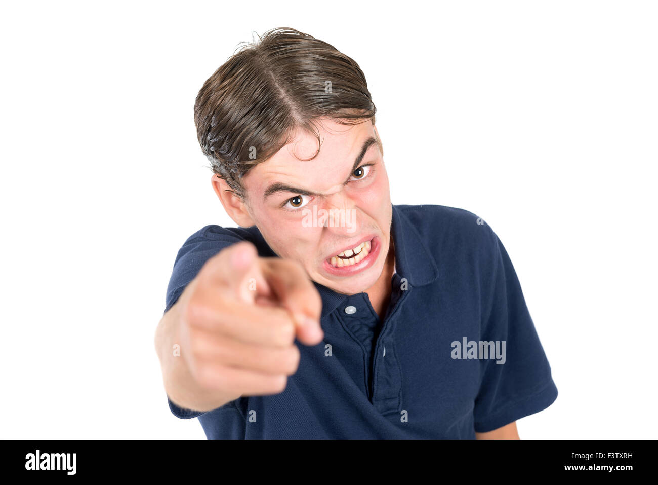 Angry geek teenage boy isolated in white Stock Photo - Alamy