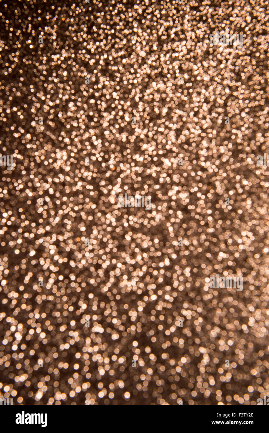 Bronze glitter background in defocus abstract Stock Photo - Alamy