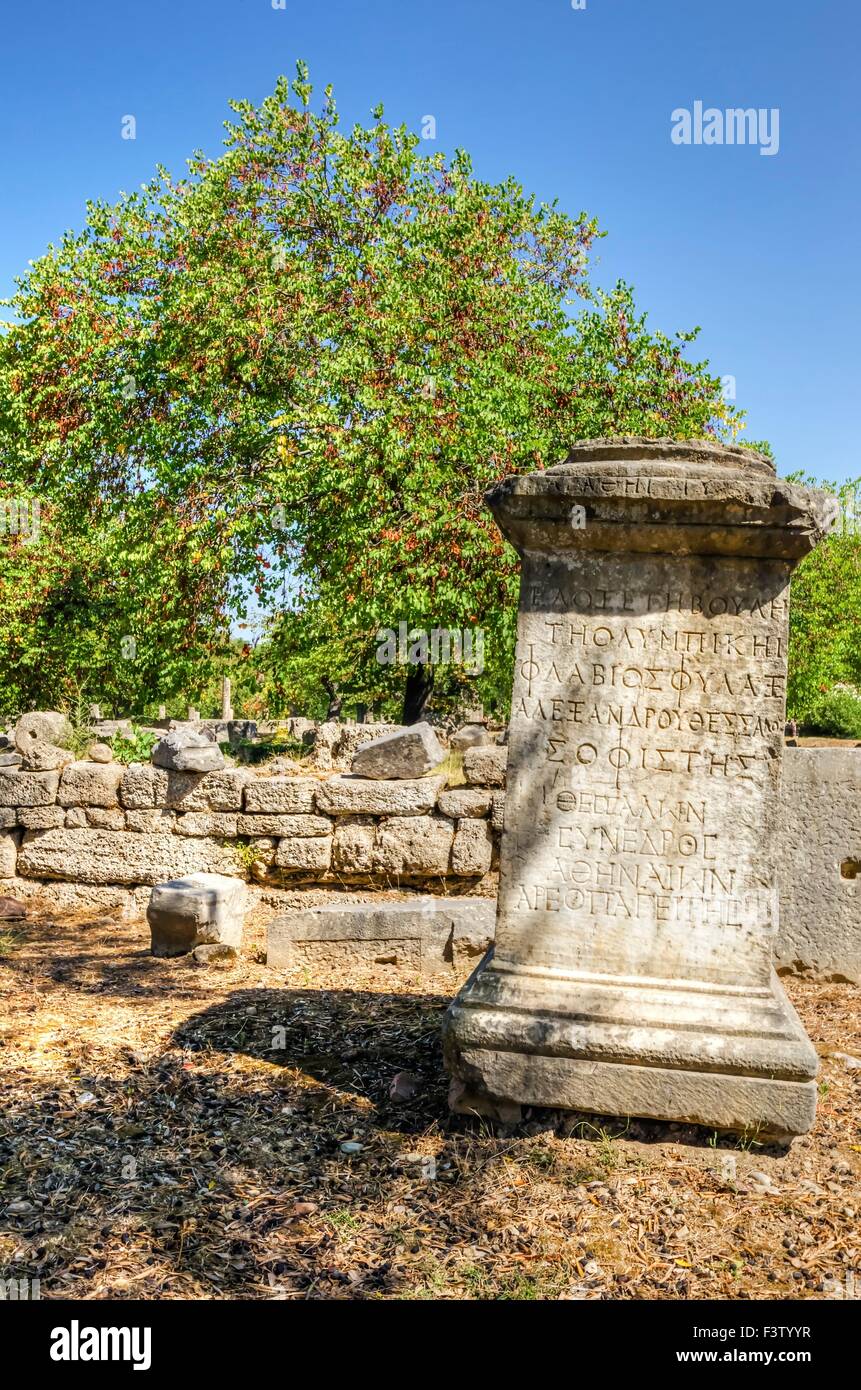 A Greek inscription at the ancient site of Olympia in Greece. The ...