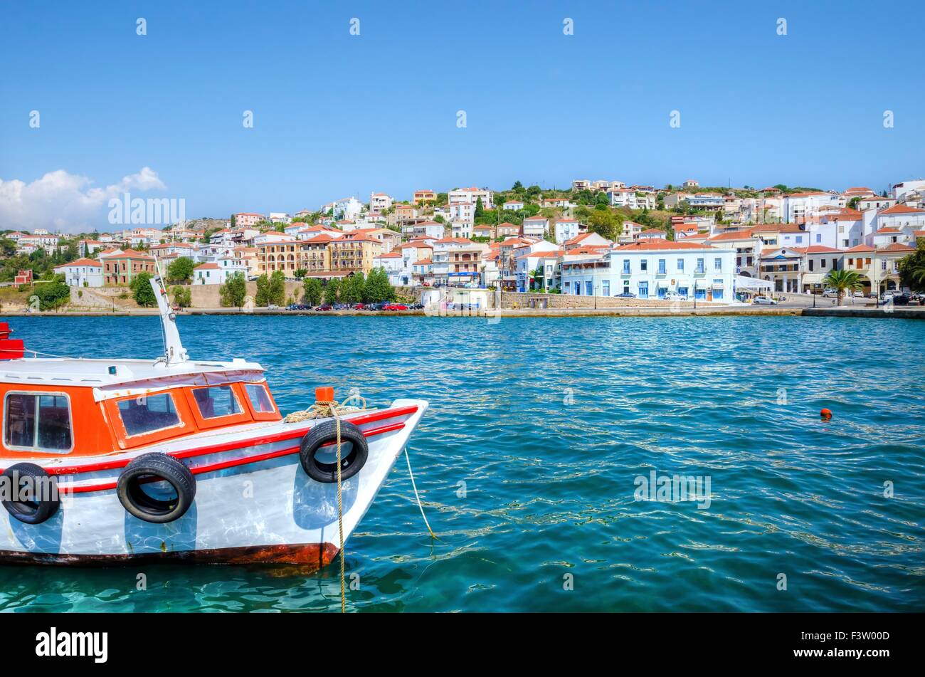 A view of a boat in the port of Pylos, a Greek city in Peloponnese ...