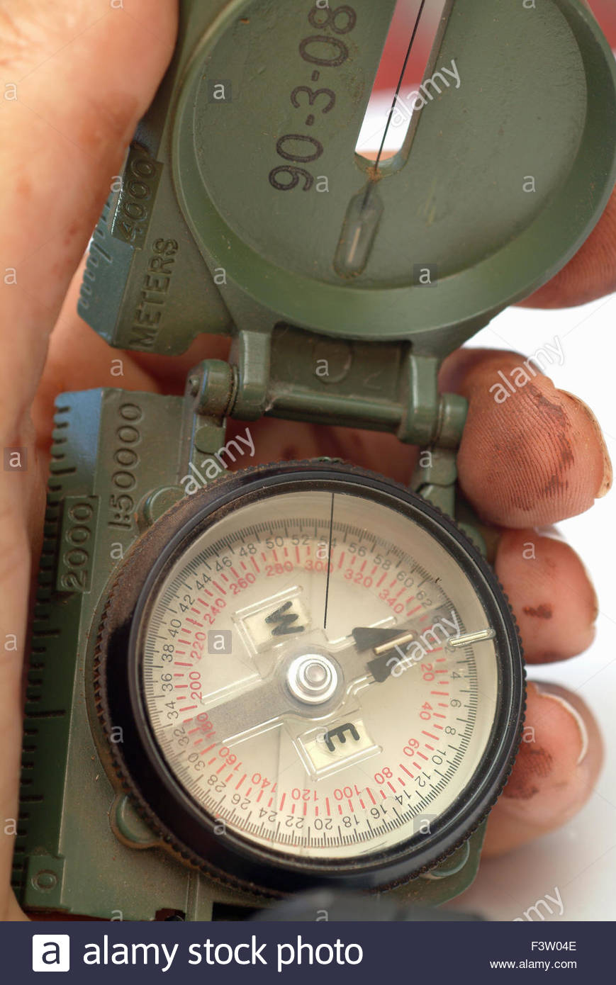 Man Holding Map Compass Close High Resolution Stock Photography and ...