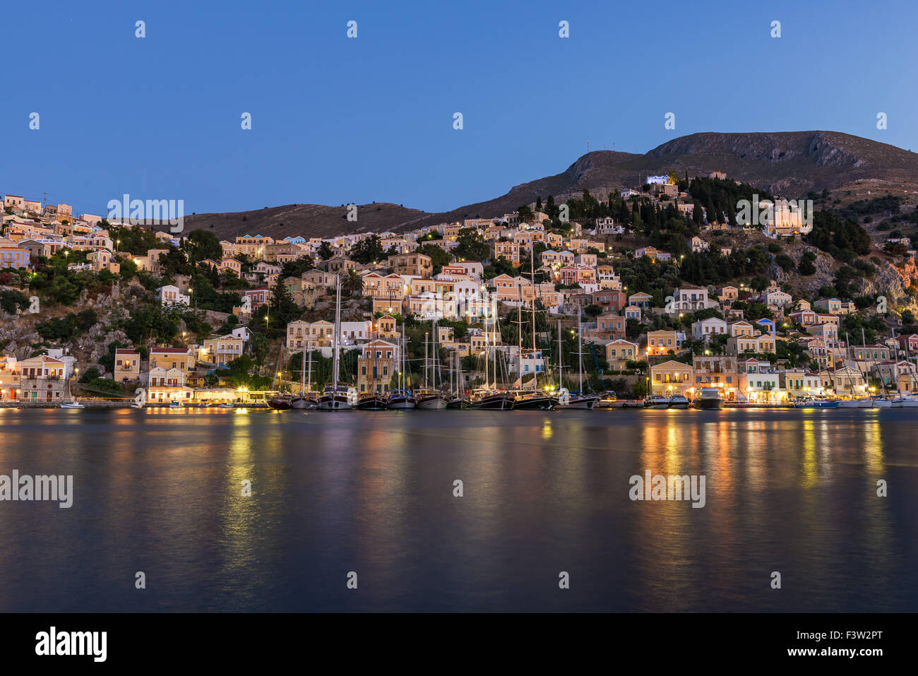 Symi island at night Stock Photo - Alamy
