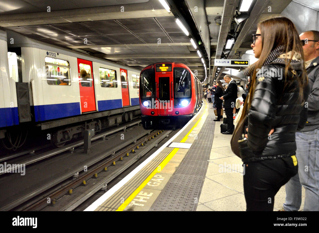 London, England, UK. Waiting for a tube train on the platform of ...