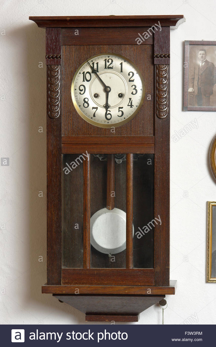Pendulum Clocks Wall High Resolution Stock Photography and Images - Alamy