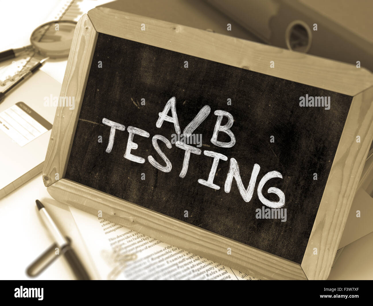 AB Testing Handwritten on Chalkboard. Composition with Small Chalkboard ...