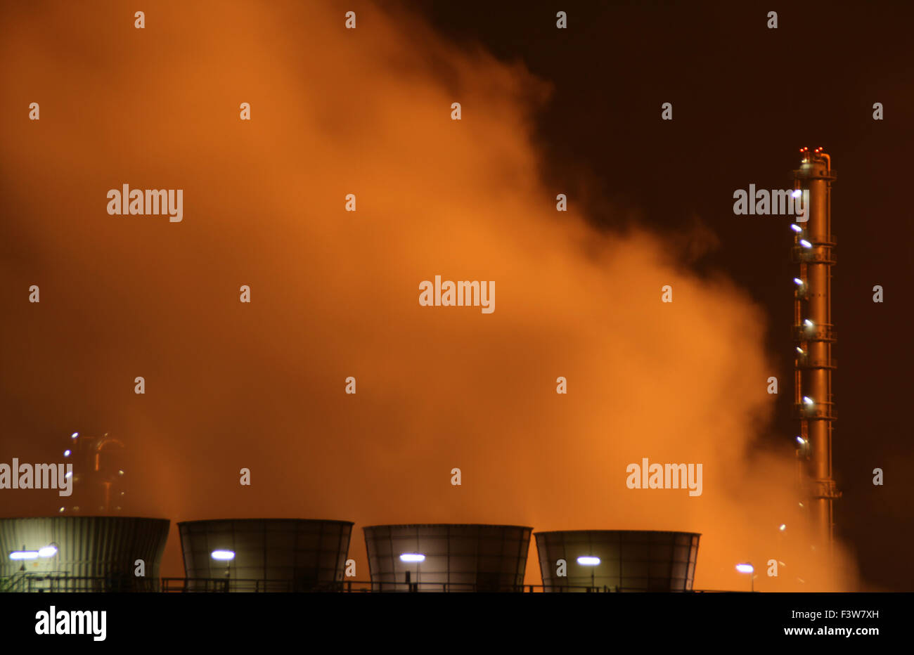 industry with fire at night Stock Photo - Alamy