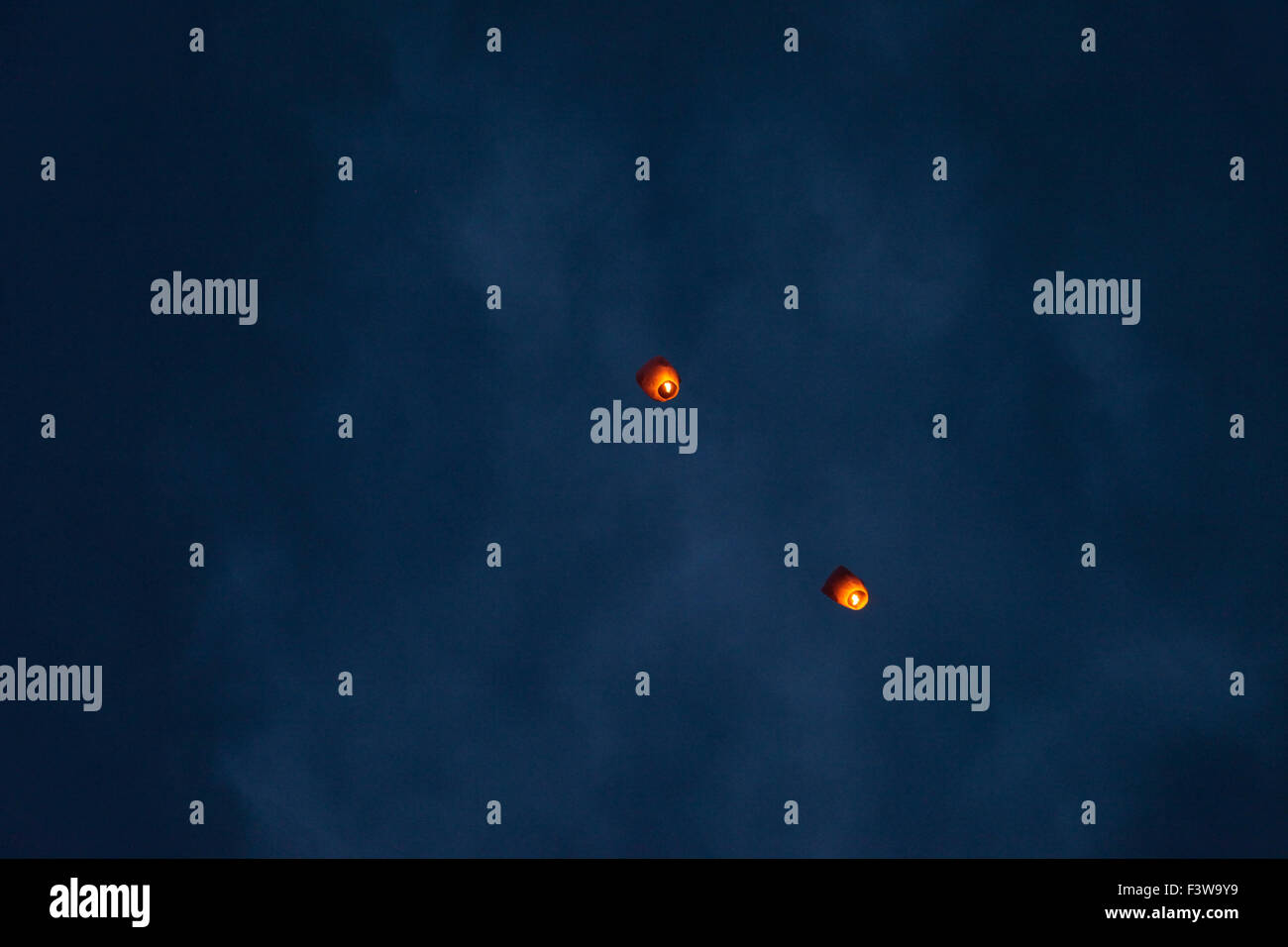 flying candle in balloon Stock Photo - Alamy