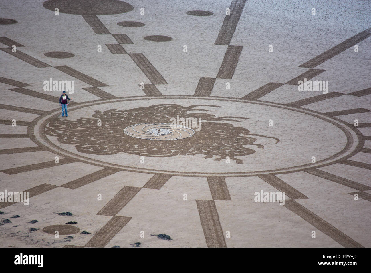 Elaborate sand circle artwork under construction on Brean Sands ...