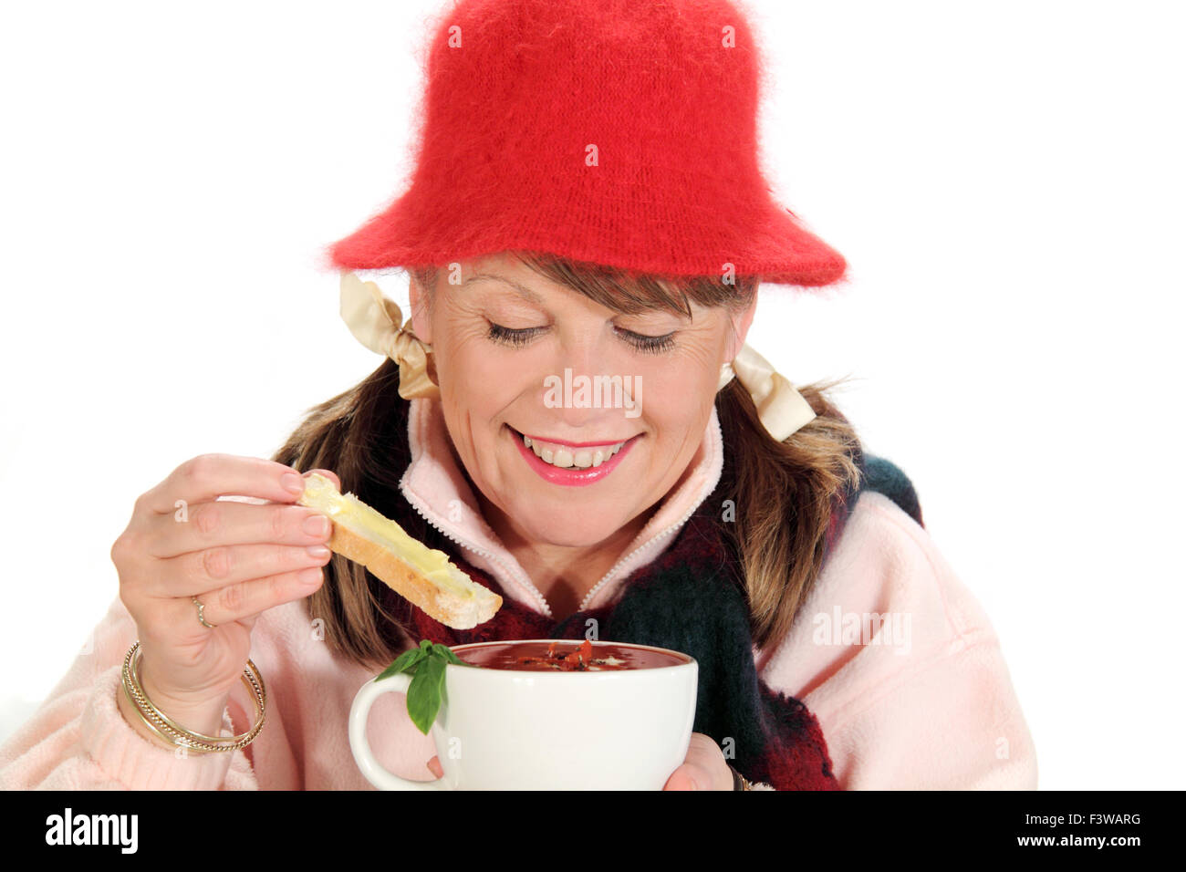 Dipping Bread In Soup Stock Photo - Alamy
