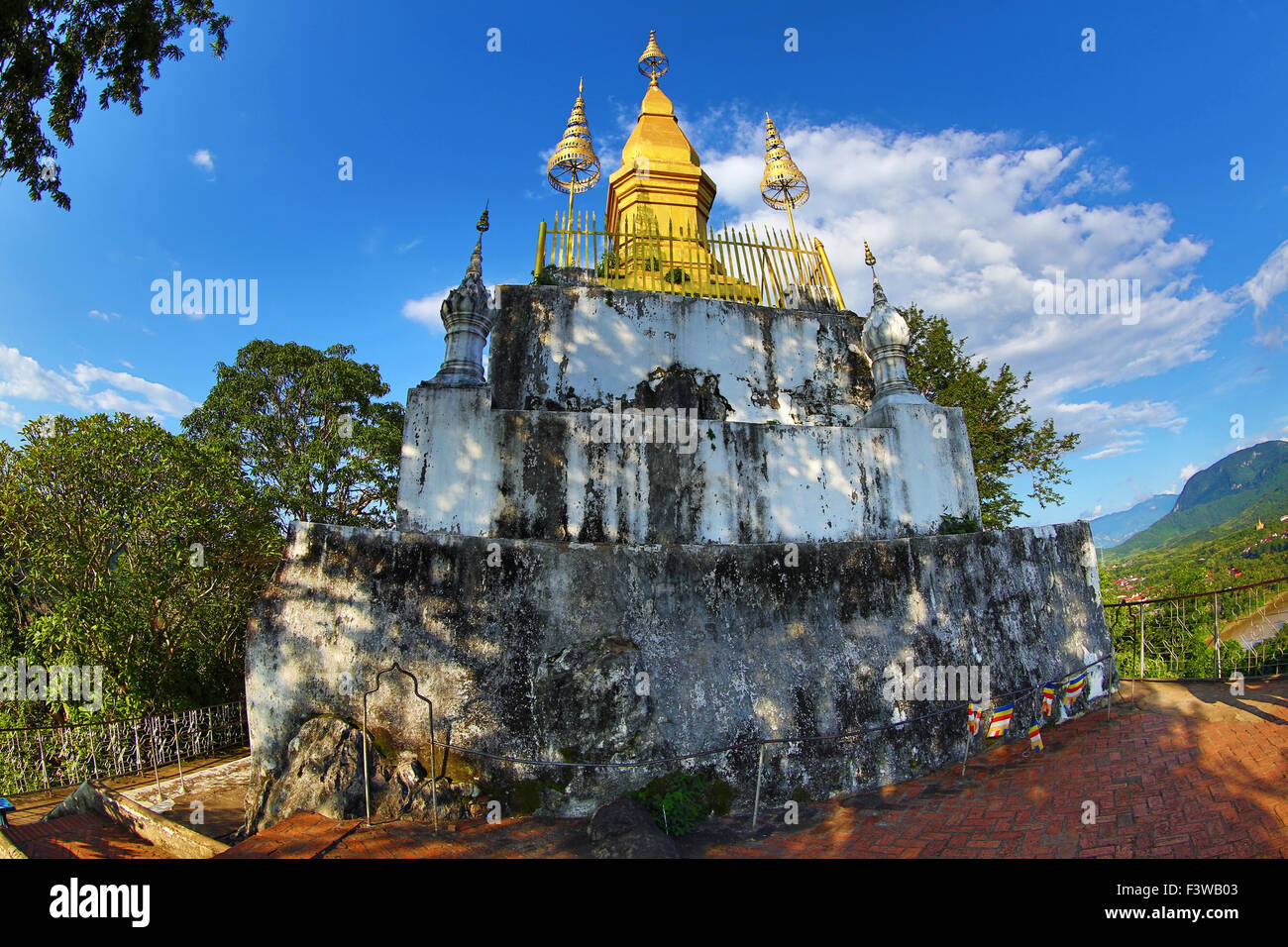 Golden Wat That Chomsi temple Stupa on Mount Phousi in Luang Prabang ...