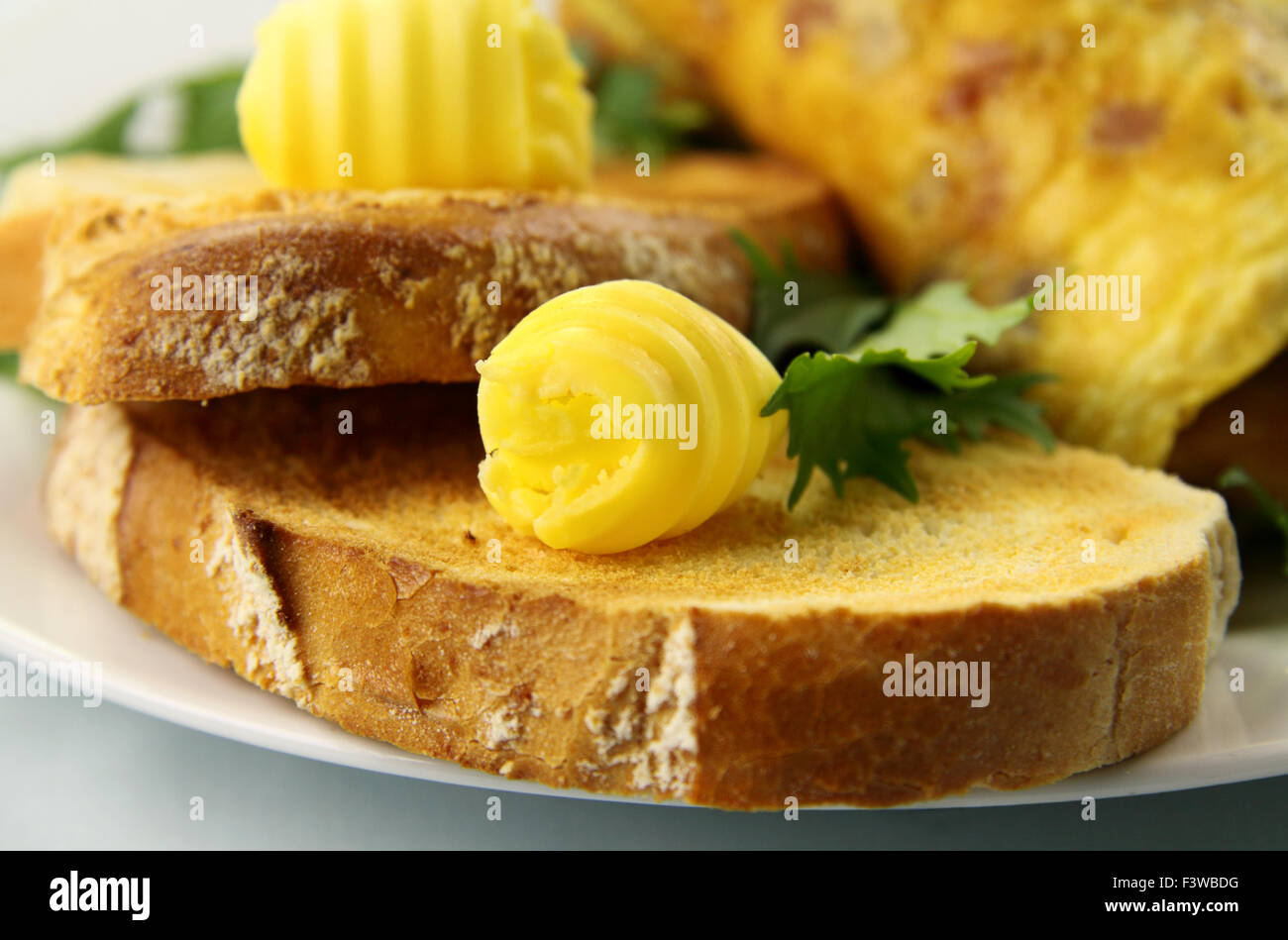 Butter On Toast Stock Photo - Alamy