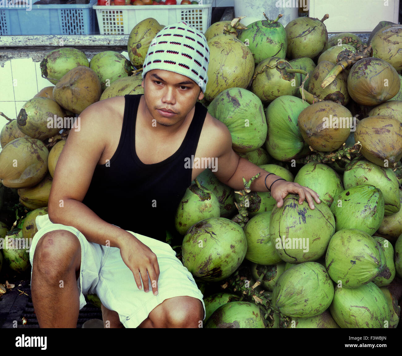 Sundanese coconut vendor in Lembang Stock Photo - Alamy