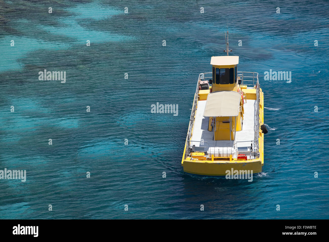 Bright yellow and blue boat hi-res stock photography and images - Alamy