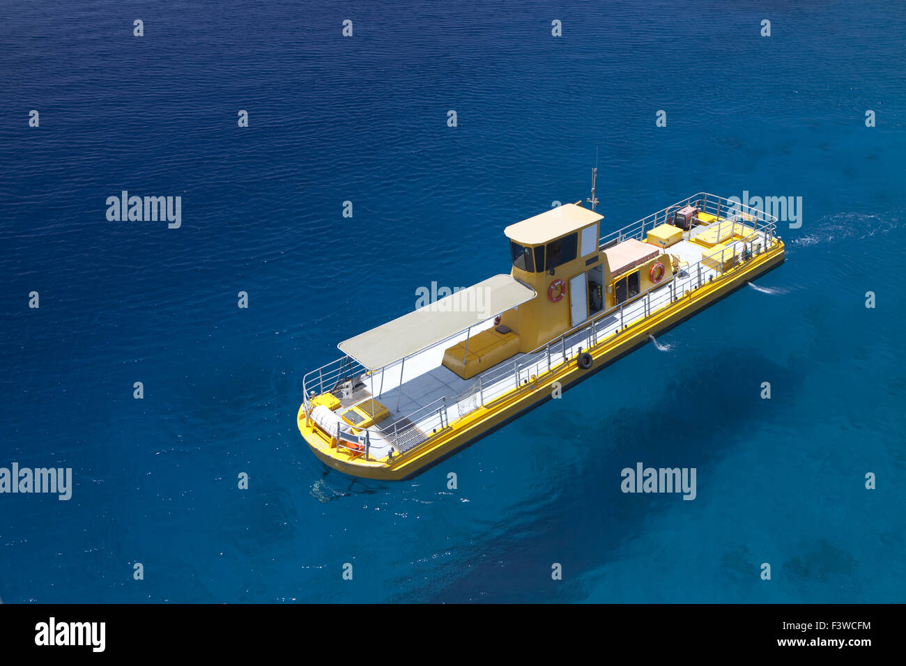 Bright yellow and blue boat hi-res stock photography and images - Alamy