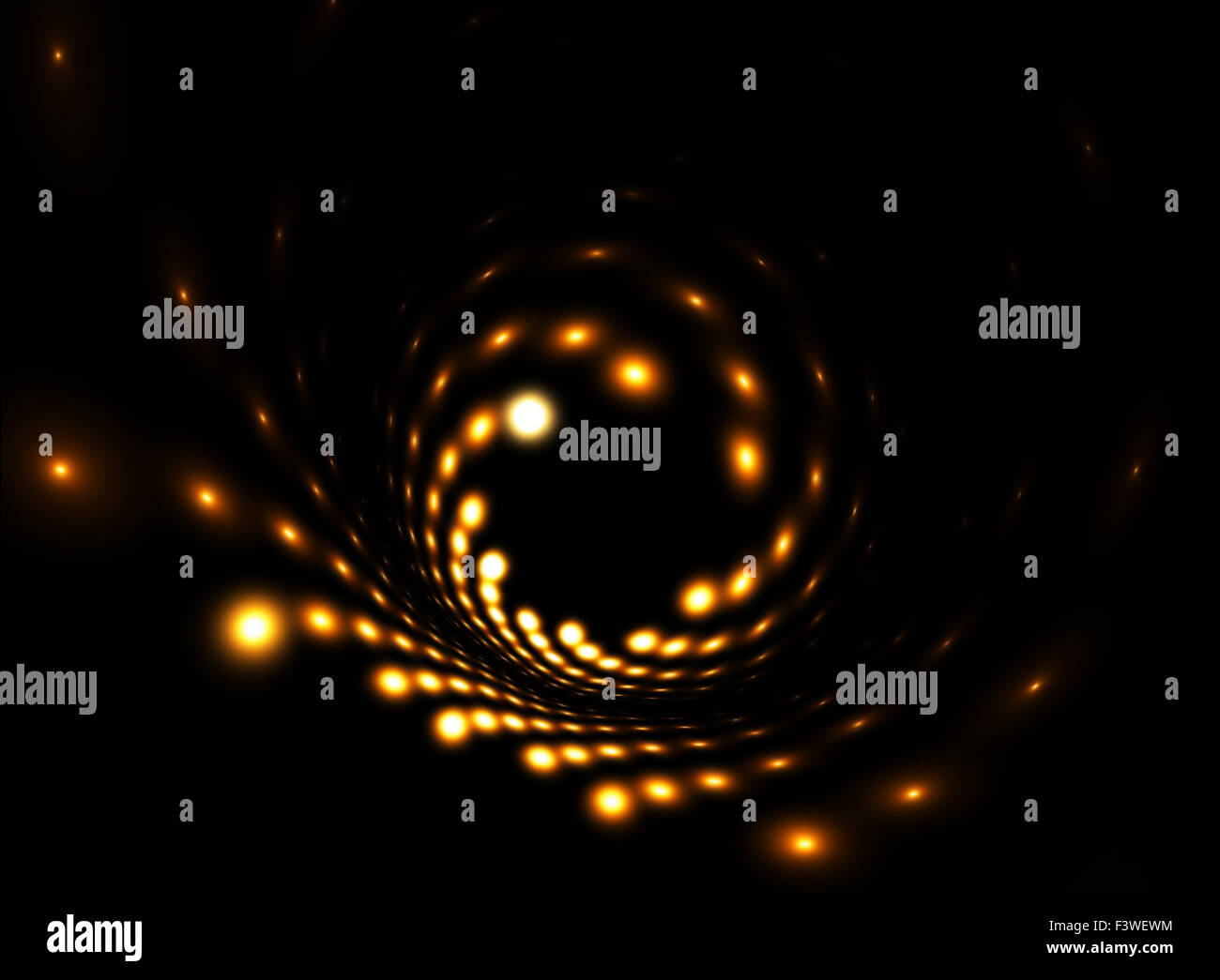 golden orbs of light rotating Stock Photo - Alamy