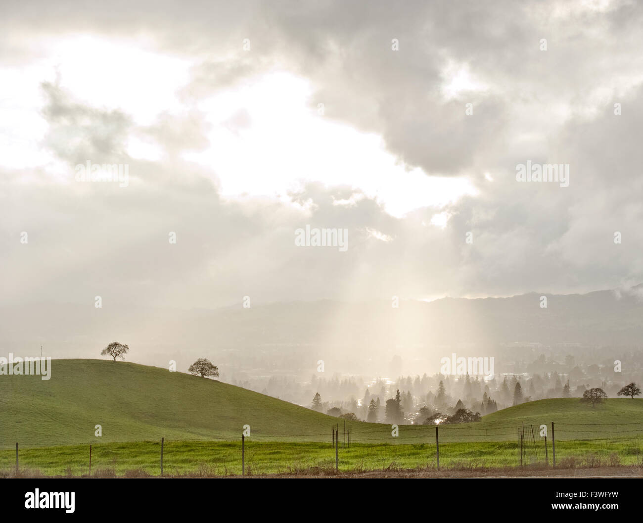 light breaking through clouds Stock Photo - Alamy