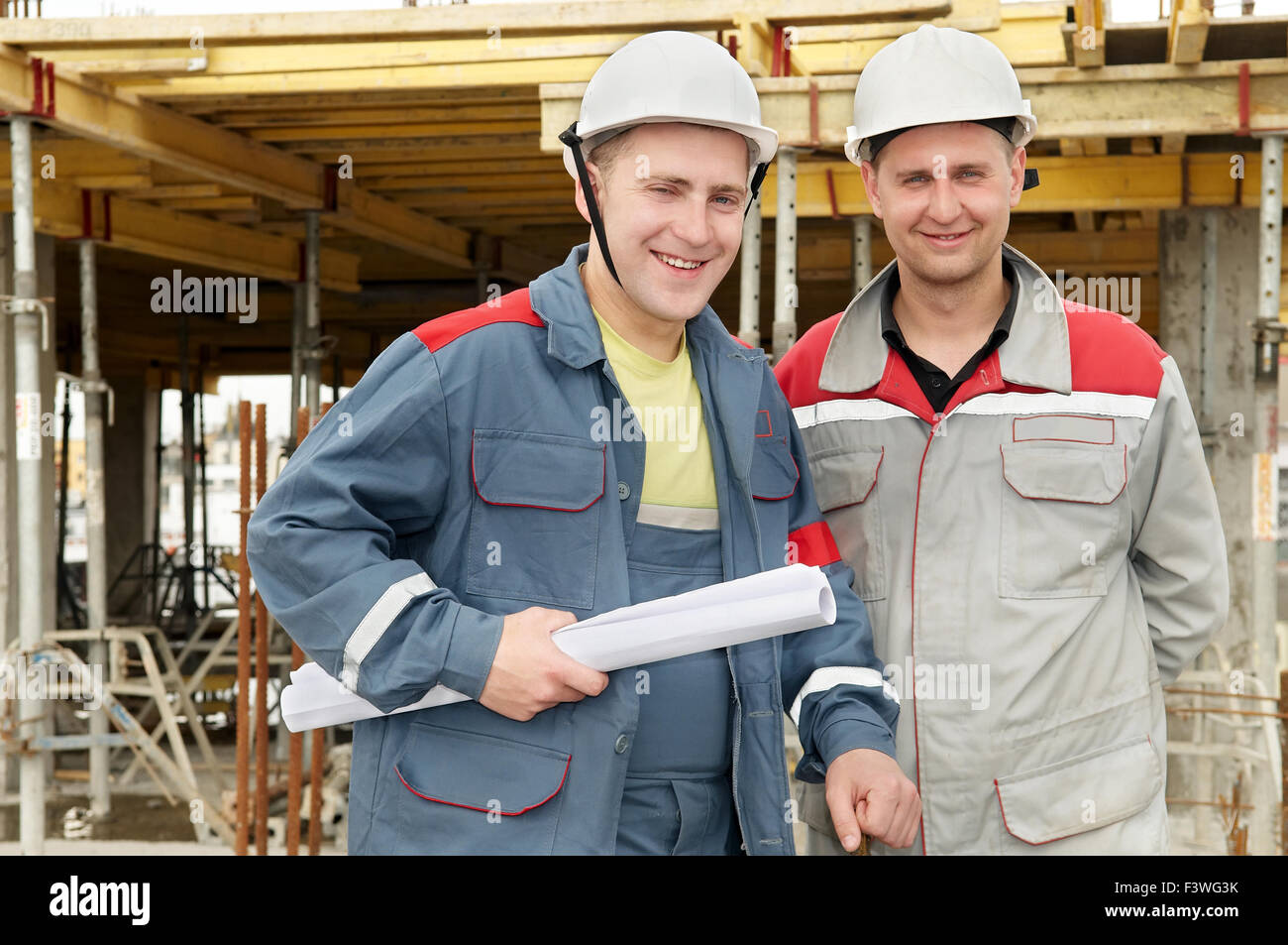 Engineers builders at construction site Stock Photo - Alamy