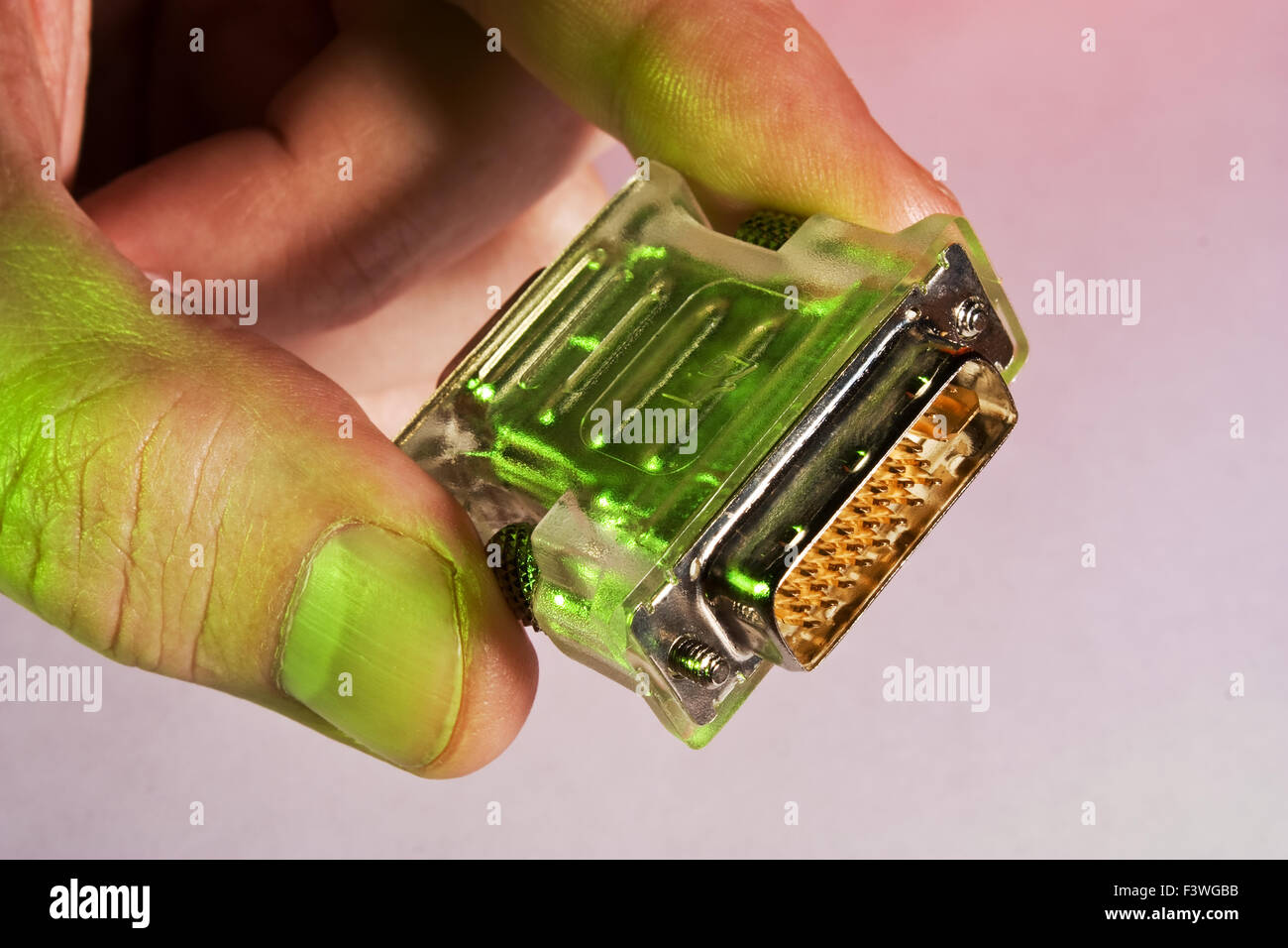 hand holds a computer plug Stock Photo - Alamy