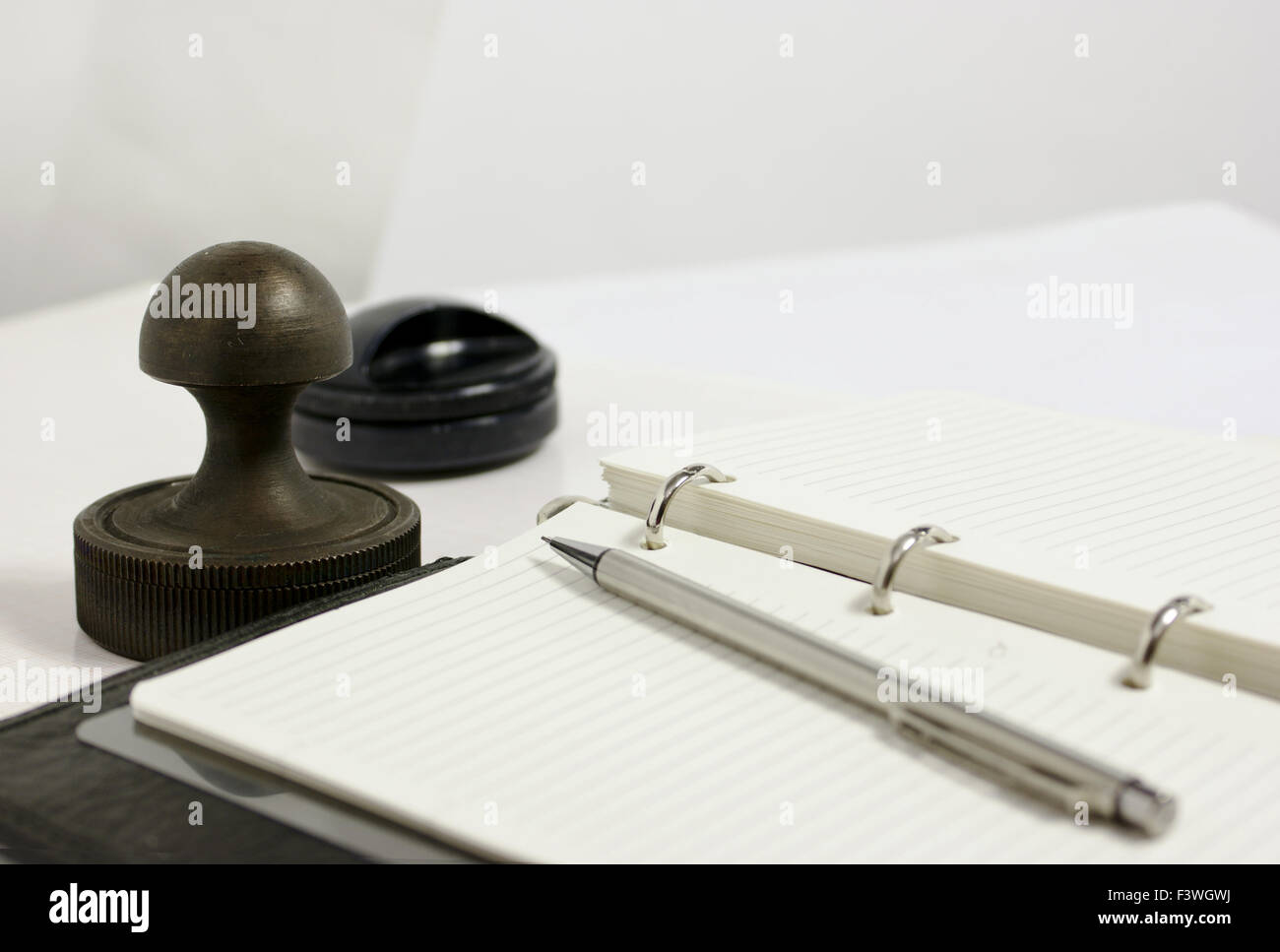 notebook and a stamp Stock Photo - Alamy