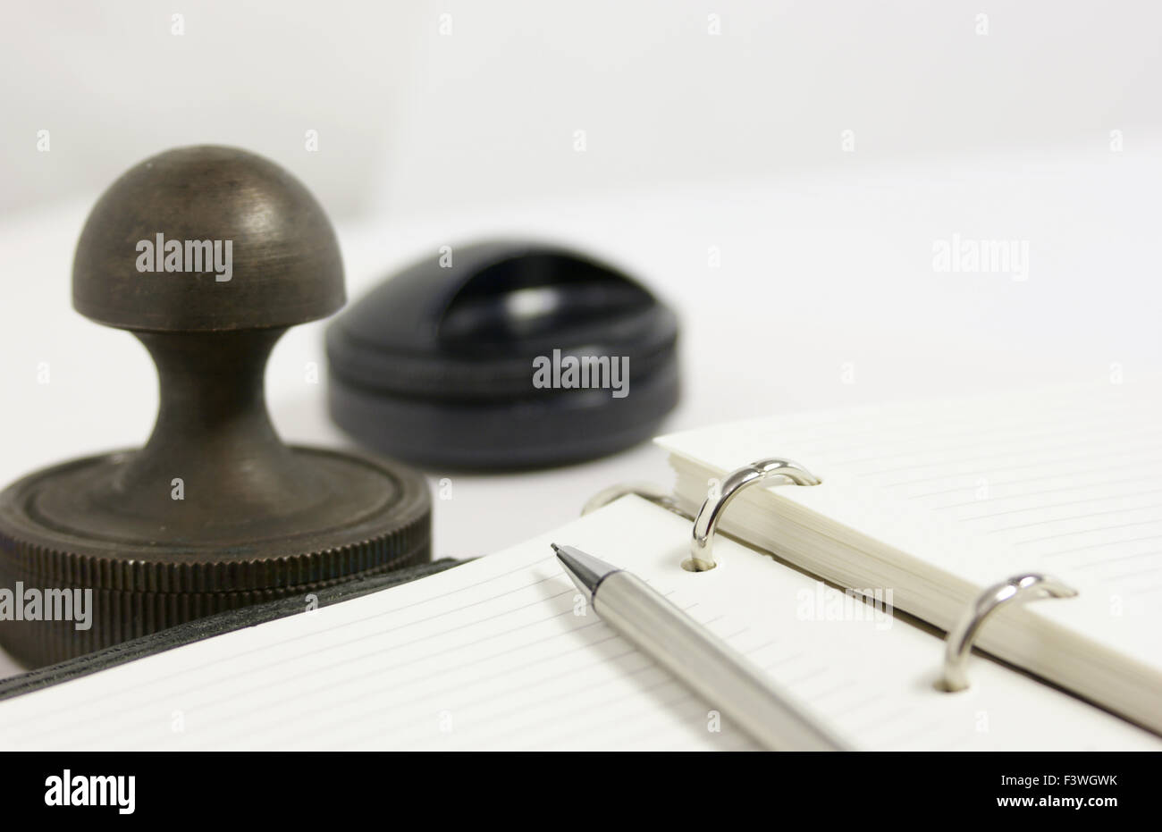 notebook and a stamp Stock Photo - Alamy