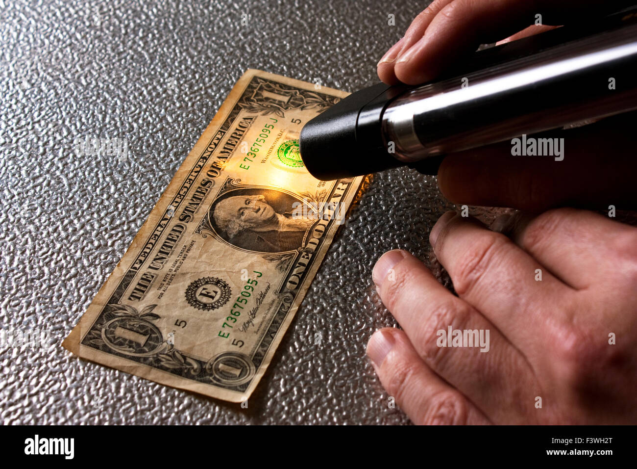 Checking dollar bill hi-res stock photography and images - Alamy