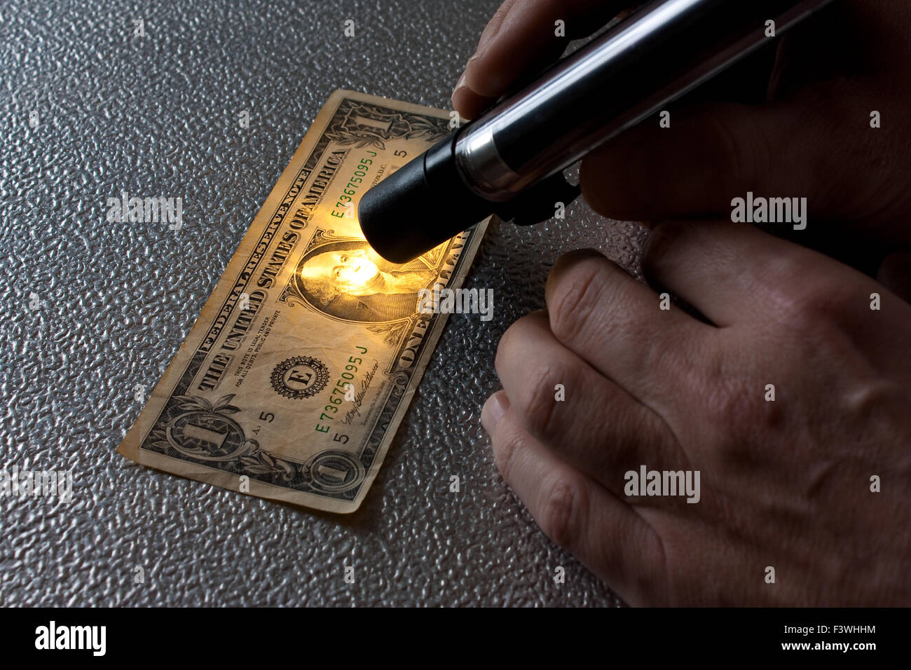 Checking dollar bill hi-res stock photography and images - Alamy