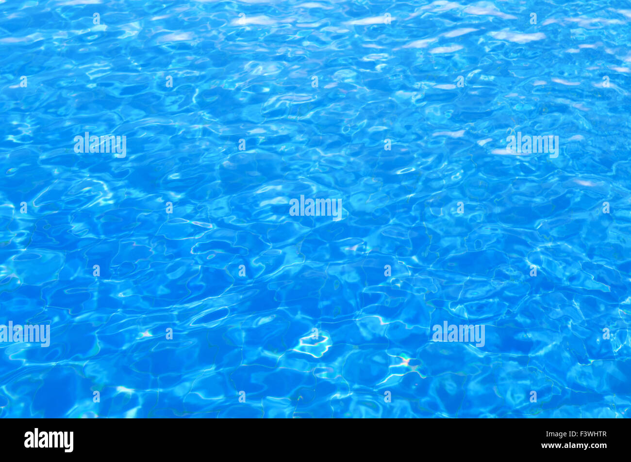 Waves on a surface of water in pool Stock Photo - Alamy