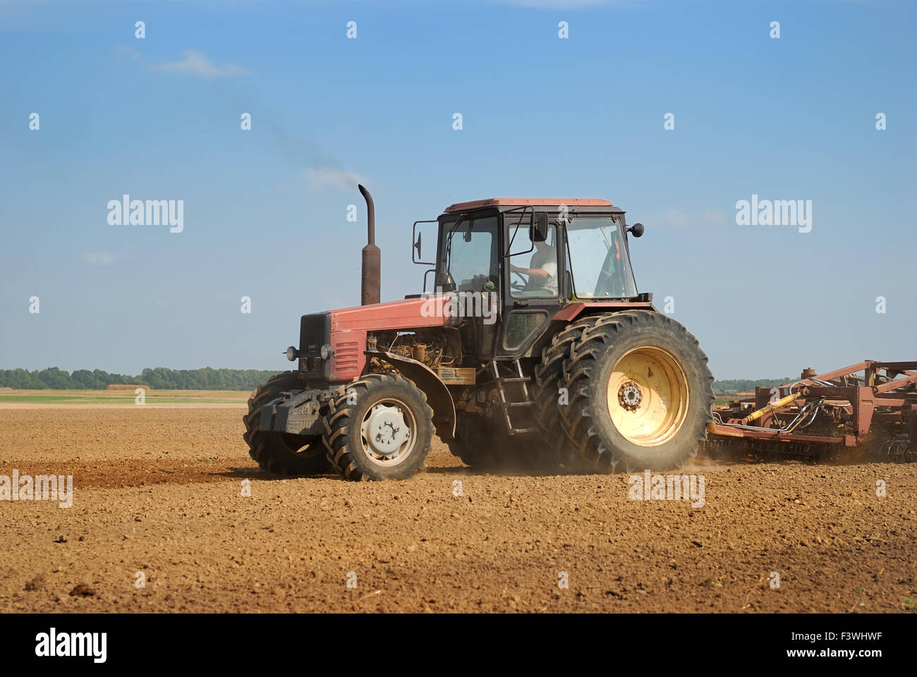 Ploughing tractor hi-res stock photography and images - Alamy