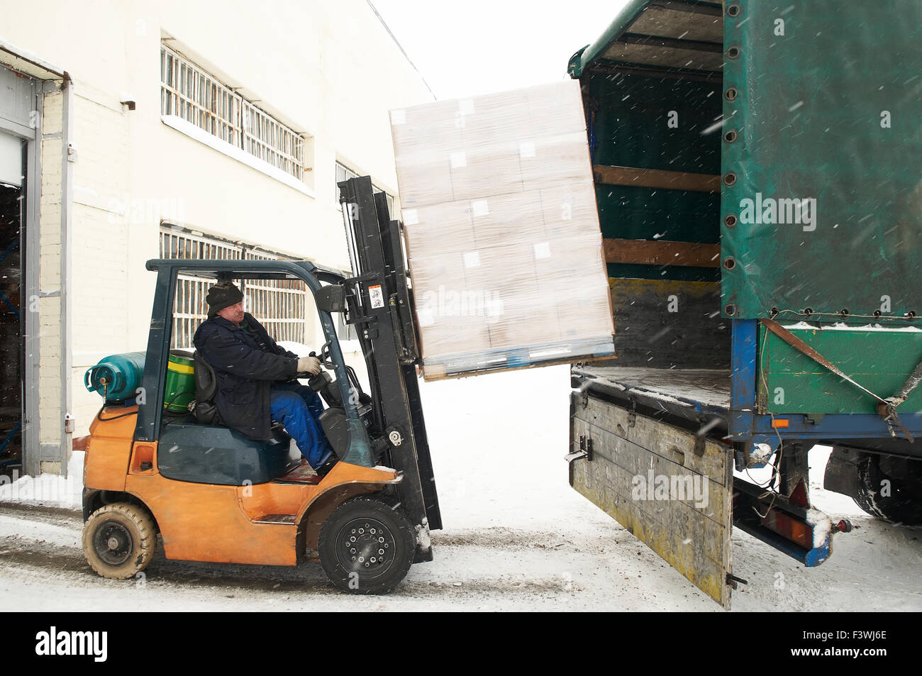 Forklift loading hi-res stock photography and images - Alamy