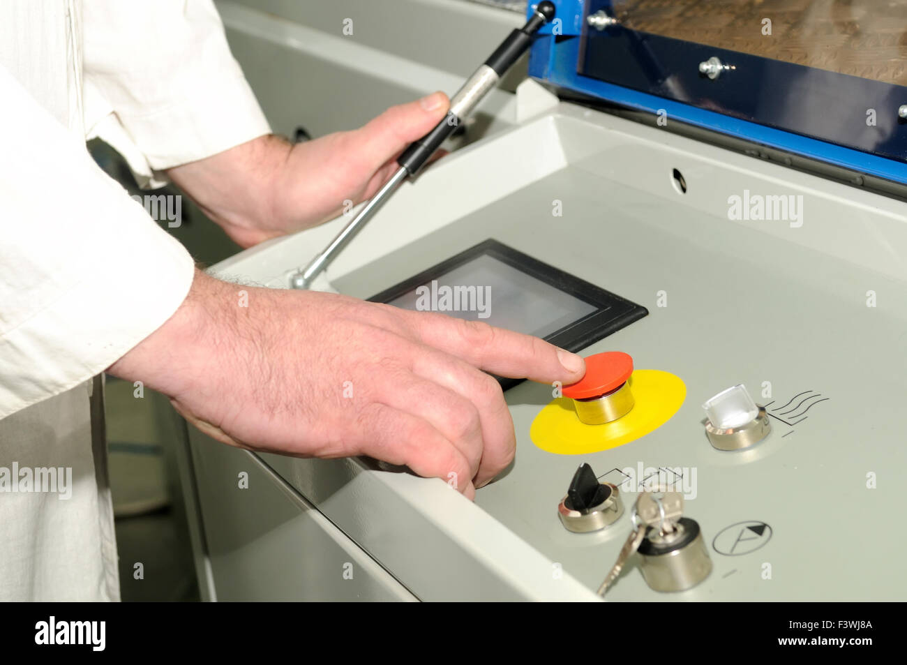 Pressing start stop button Stock Photo - Alamy