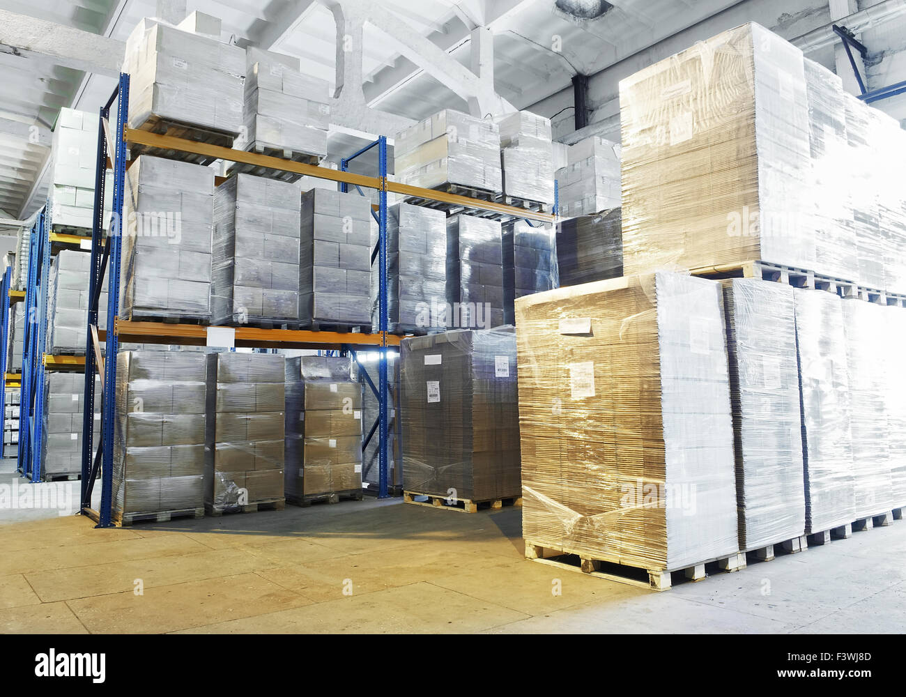 warehouse with shelves rack arrangement Stock Photo - Alamy
