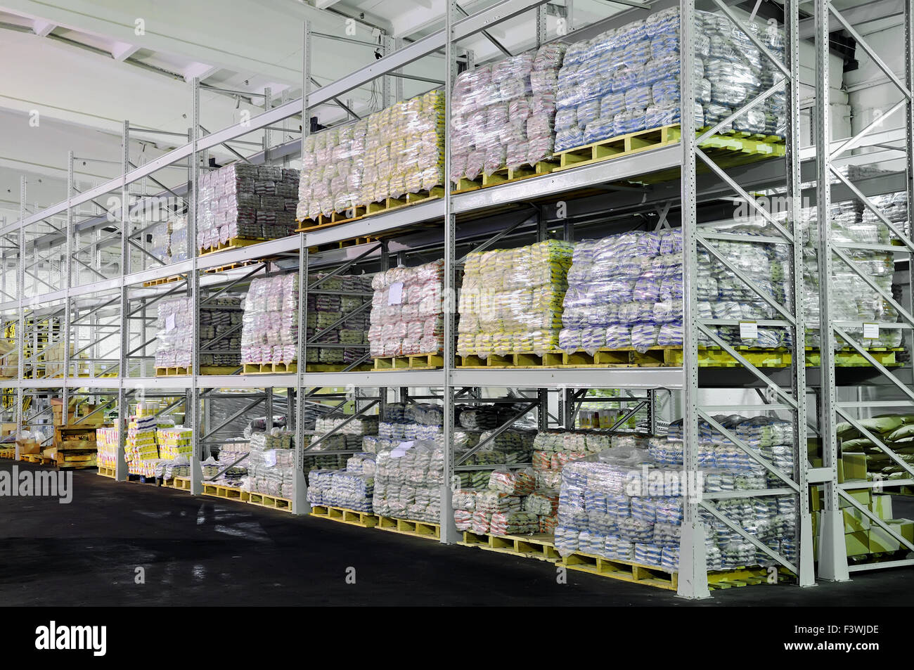 Production in warehouse shelves Stock Photo - Alamy