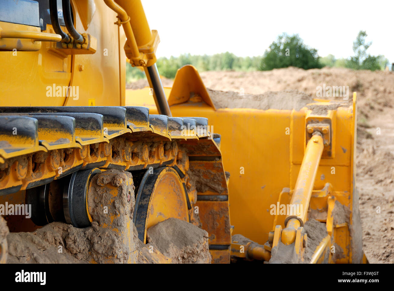 bulldozer track in action Stock Photo - Alamy