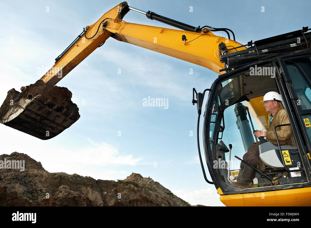 Excavator loader works Stock Photo - Alamy