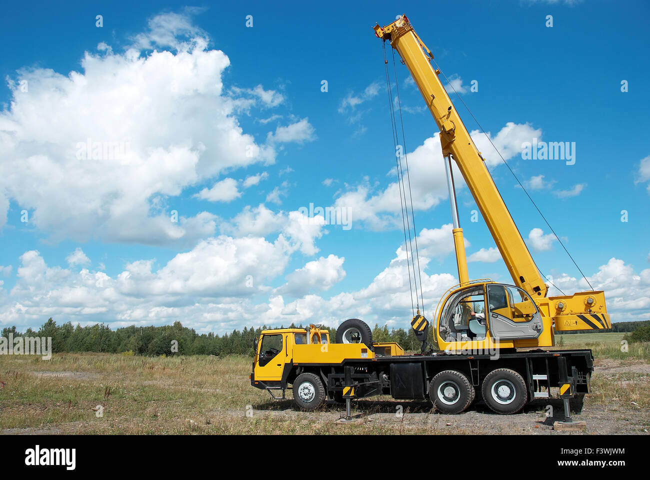 mobile crane with risen boom outdoors Stock Photo - Alamy