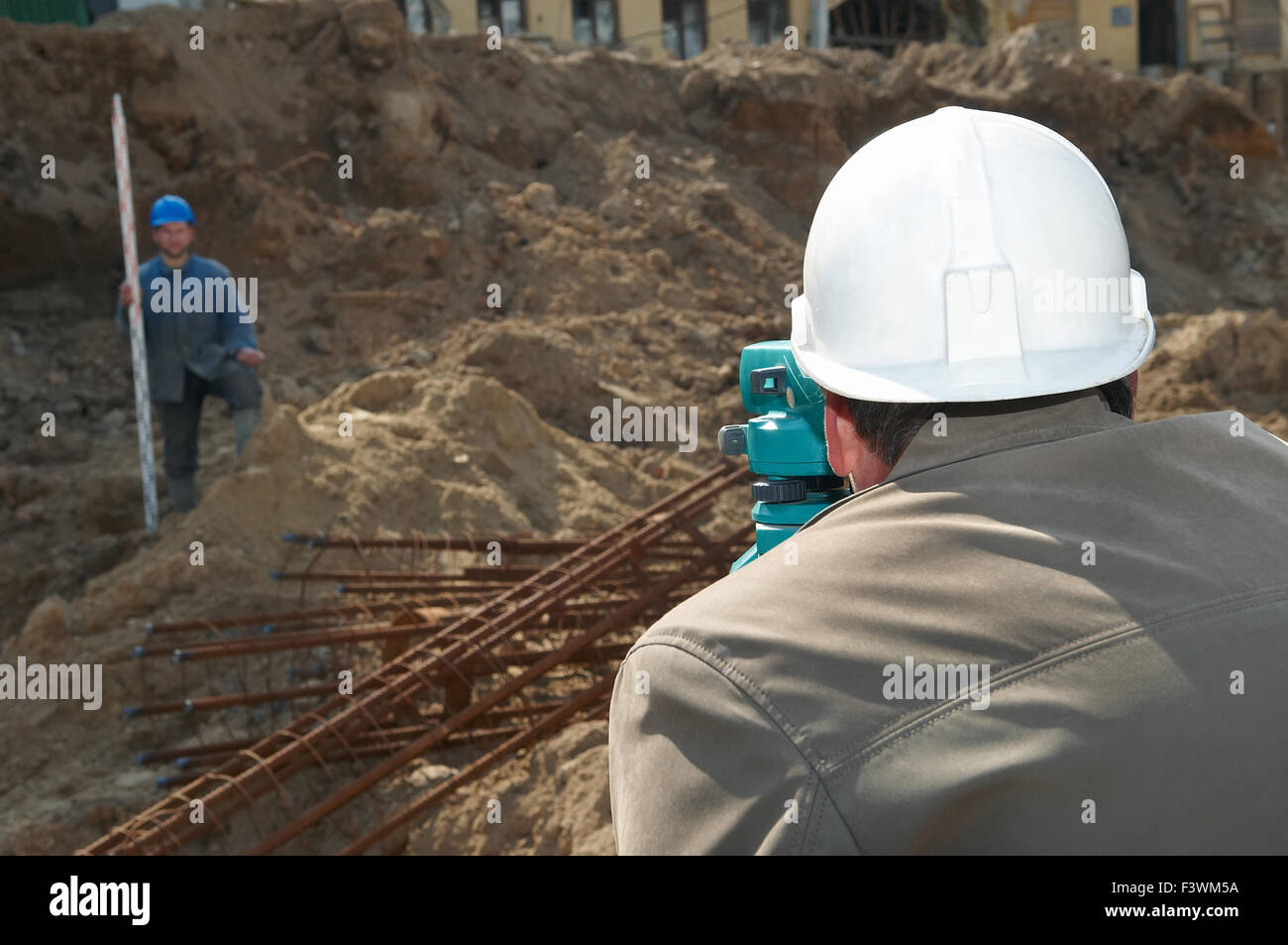 surveyor at construction work Stock Photo - Alamy
