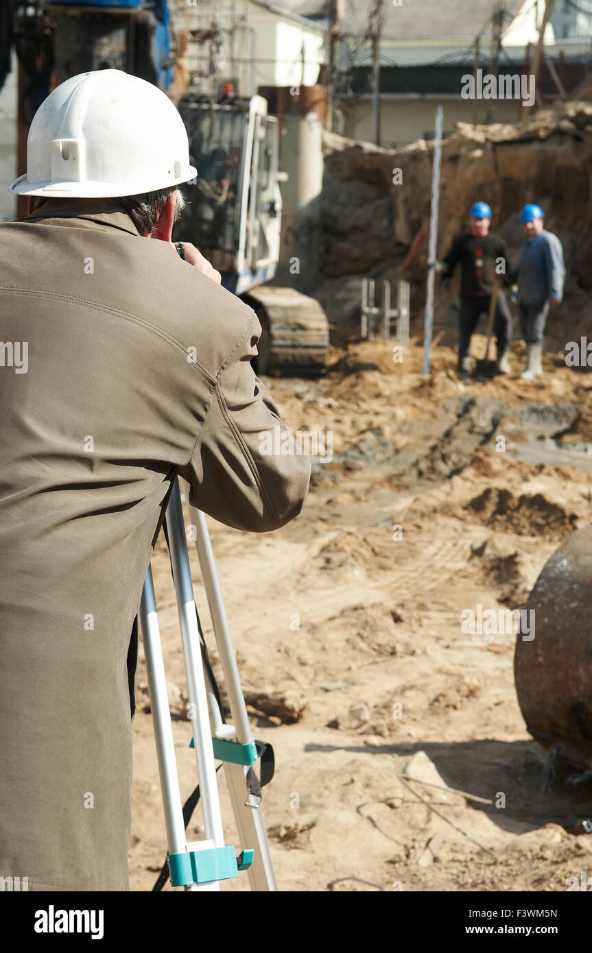 surveyor at construction work Stock Photo - Alamy
