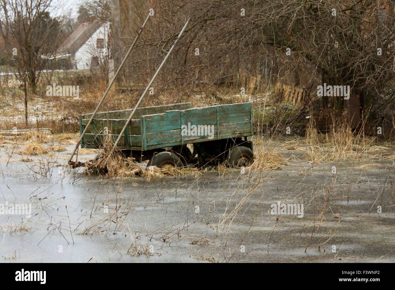 barrow in high water and ice Stock Photo - Alamy