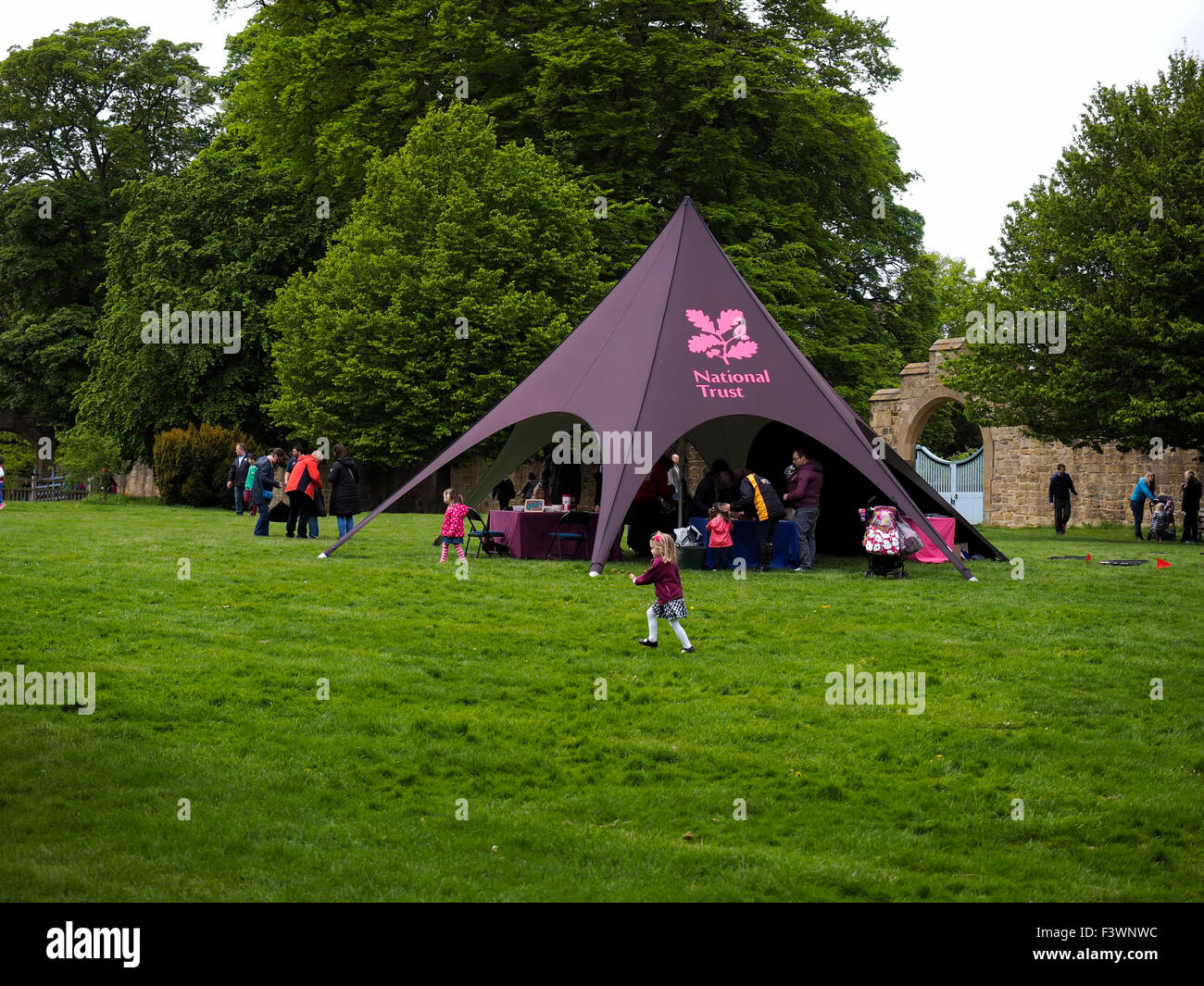 Pyramid shaped tent on large grass field Derbyshire England Stock Photo ...