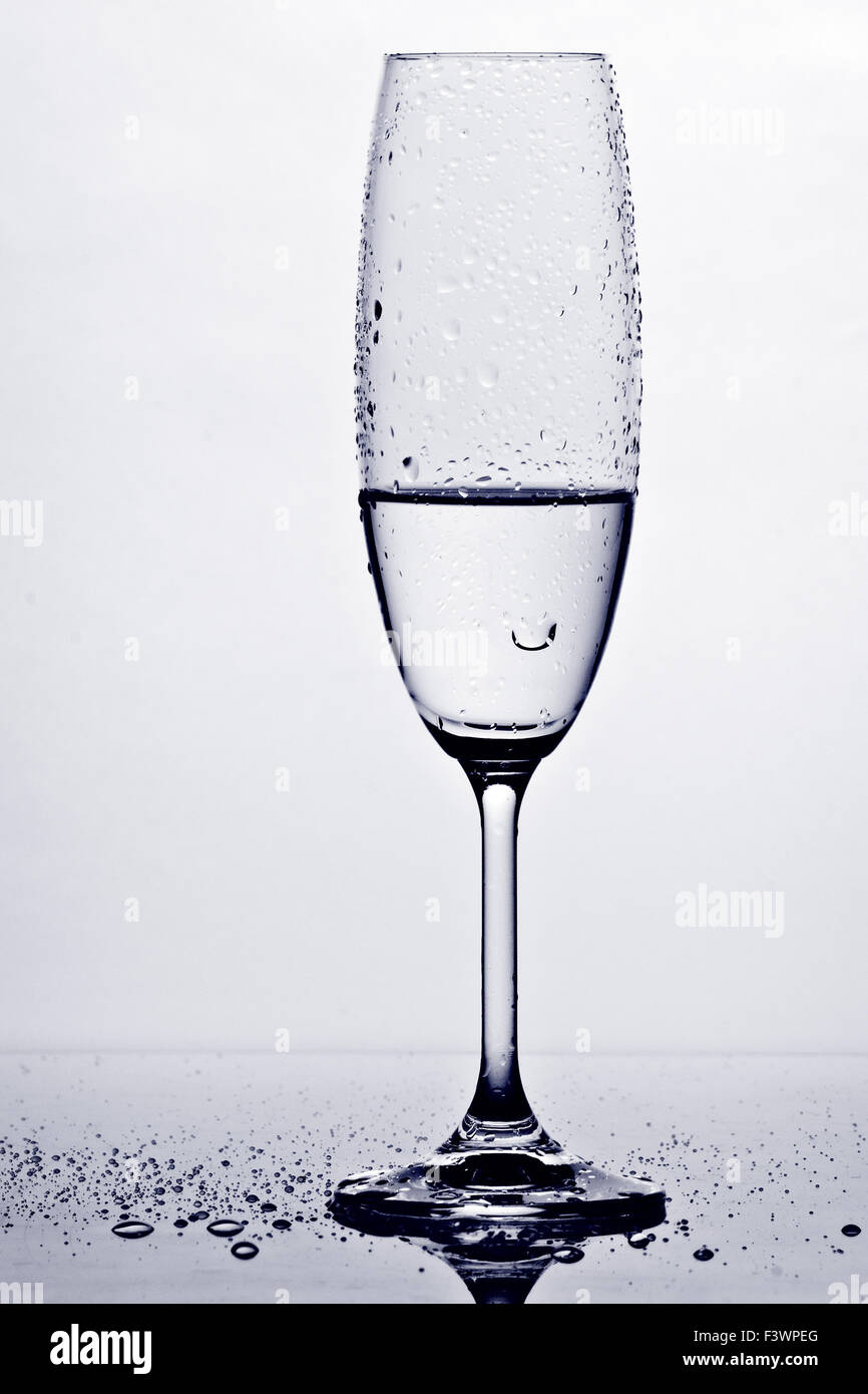 champagne glass with drops Stock Photo - Alamy
